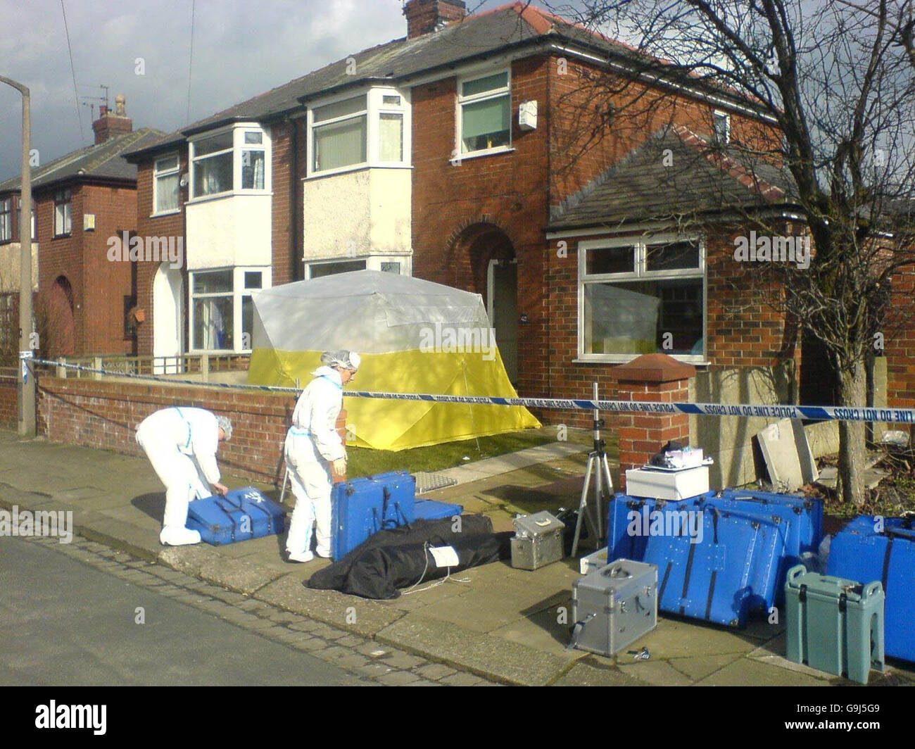 Previously unissued picture of police forensics officers outside the ...