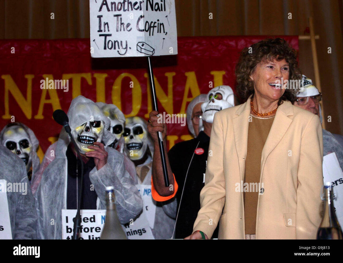 MP Kate Hoey stands as pensioners dressed as skeletons arrive on stage ...