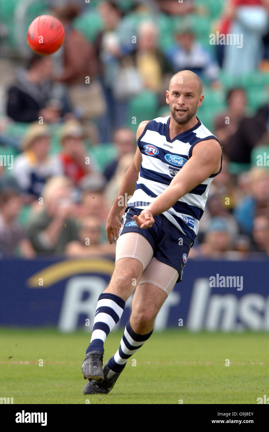 Australian football action full length hi-res stock photography and ...