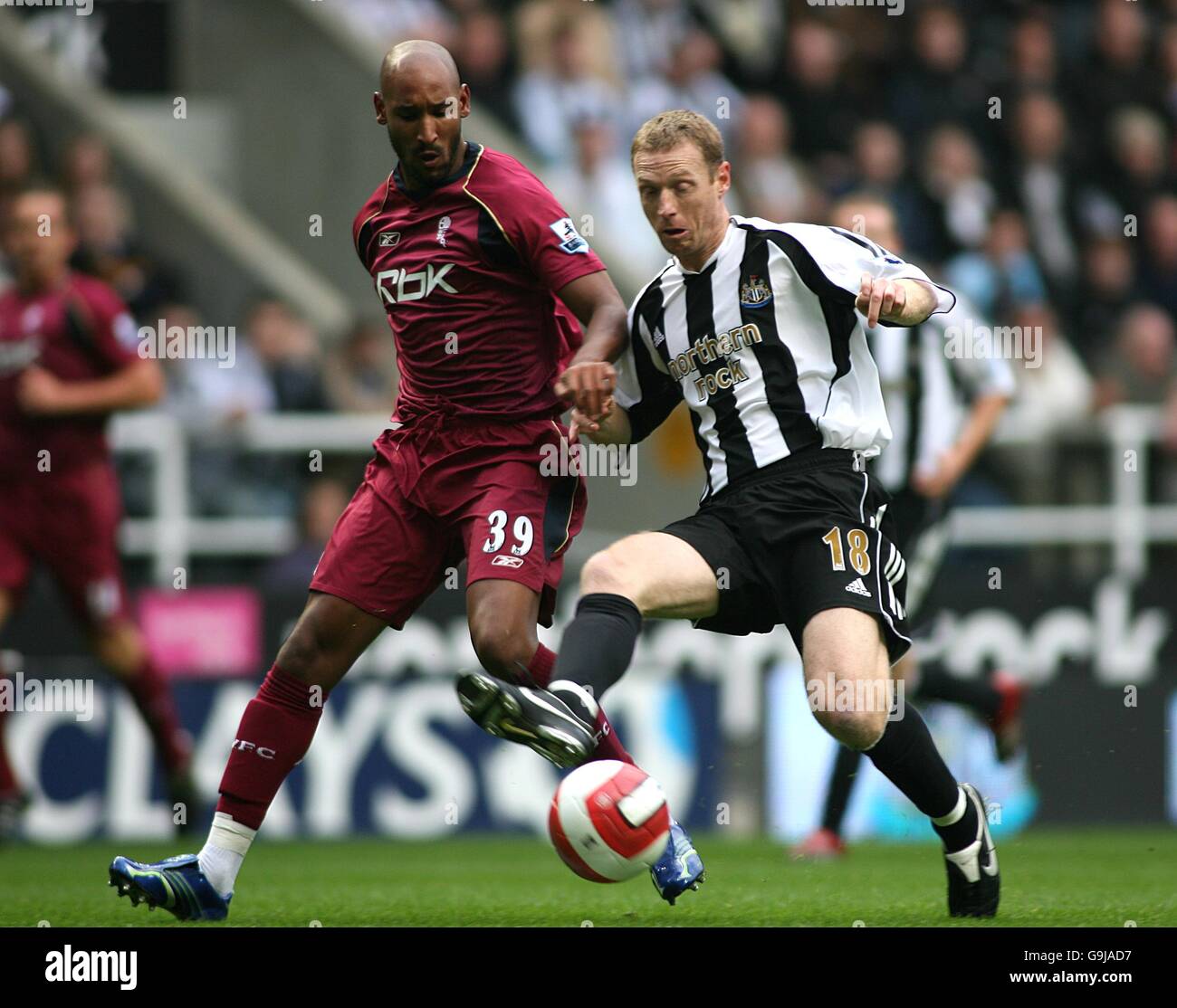 Bolton Wanderers' Nicolas Anelka and Newcastle United's Craig Moore ...