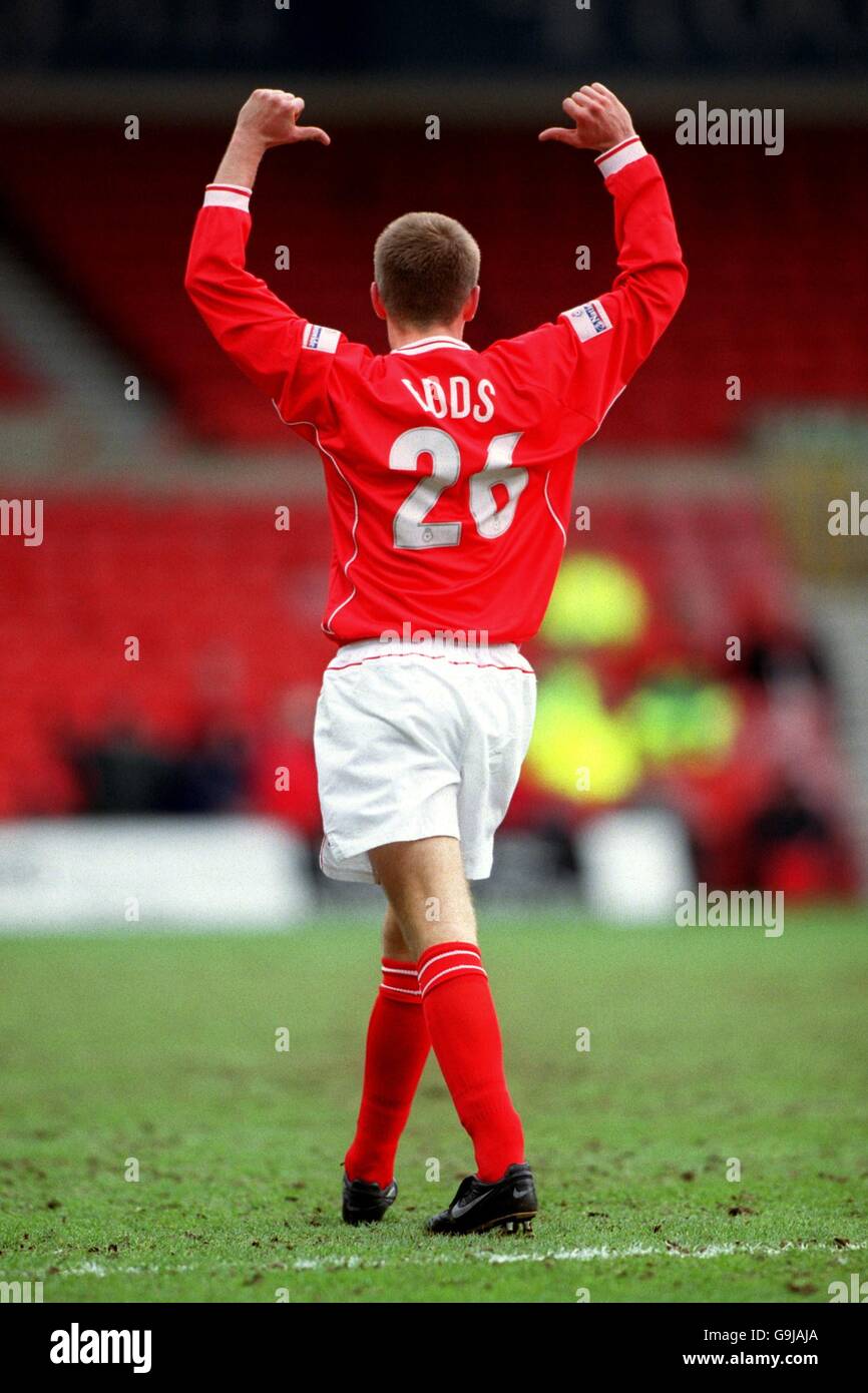 Nottingham Forest's Gareth Edds points to his name on the back of his ...