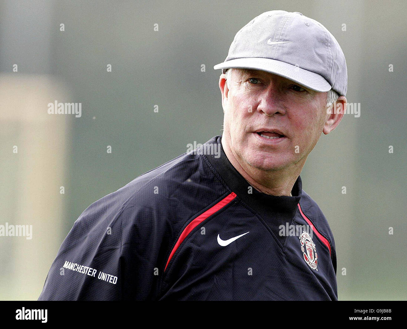 Sir alex ferguson during training session at carrington training ground ...