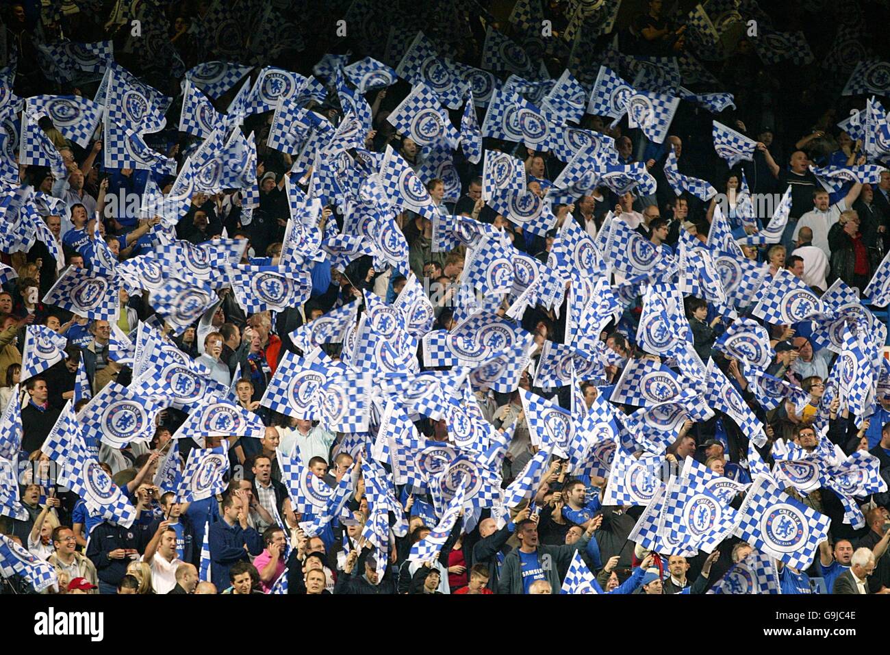 Chelsea fans with flags prior to kick off hi-res stock photography and ...