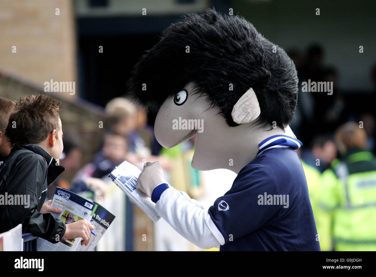 Southend united mascot signs autographs for young fans hi-res stock ...