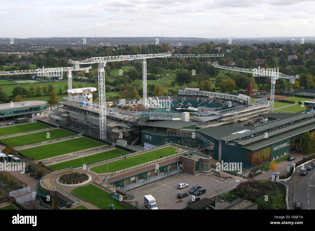 Construction work continues as a new roof is built over Centre Court at ...