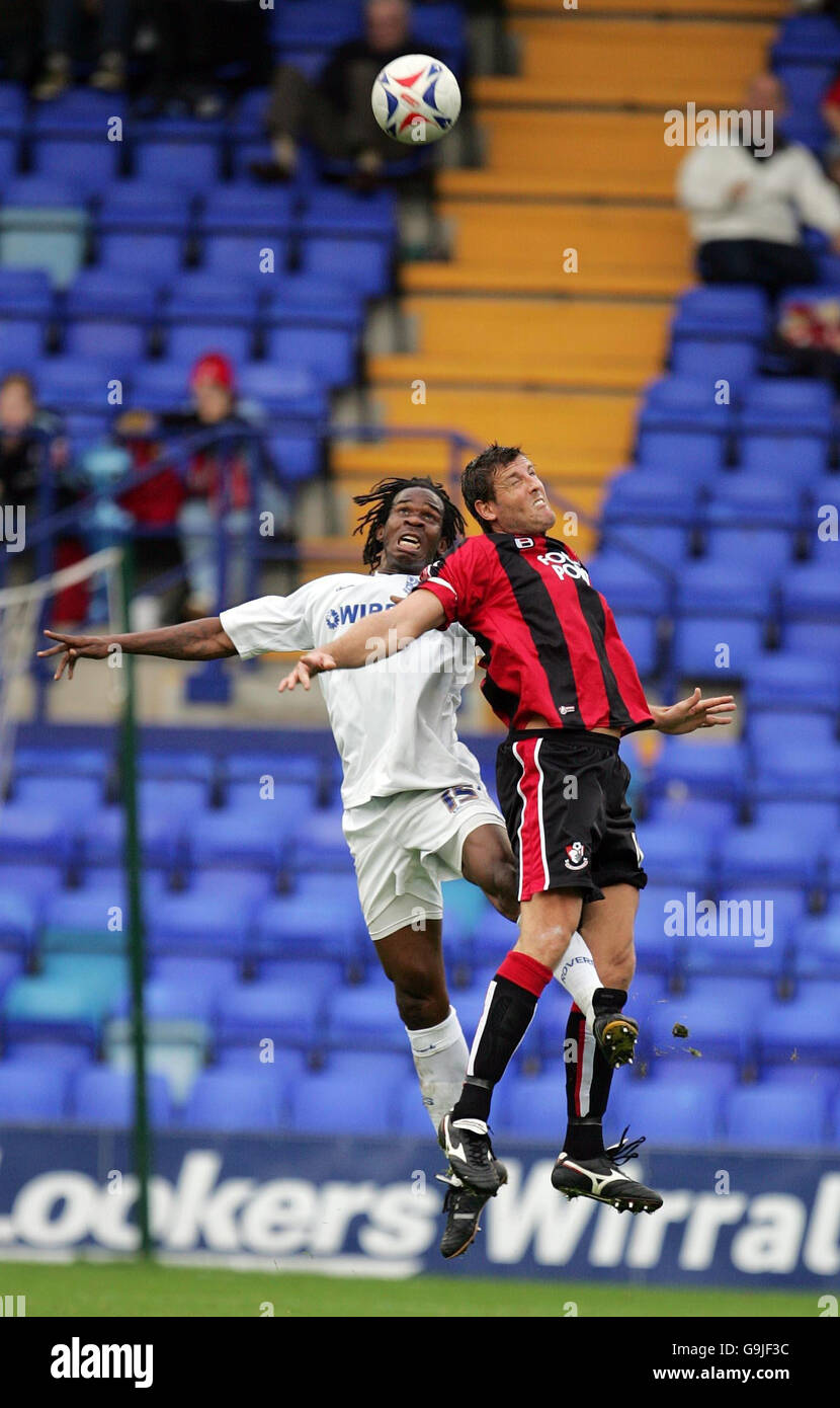 Tranmere's Ian Goodison and Bournemouth's Steve Fletcher jump for the ball during the Coca-Cola ...