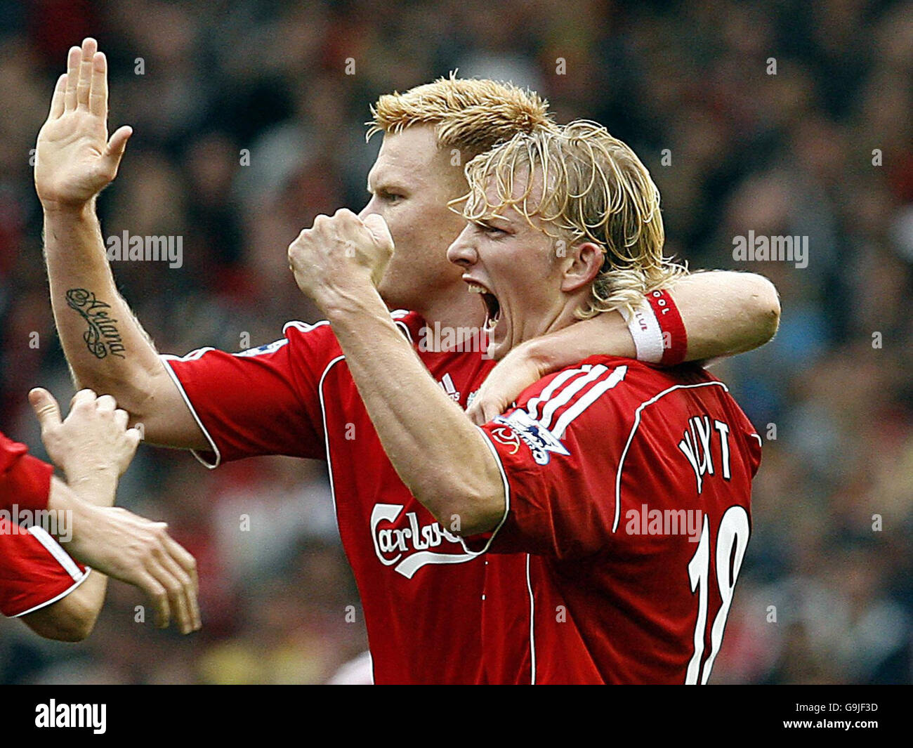 Liverpool's Dirk Kuyt celebrates scoring against Aston Villa during the ...