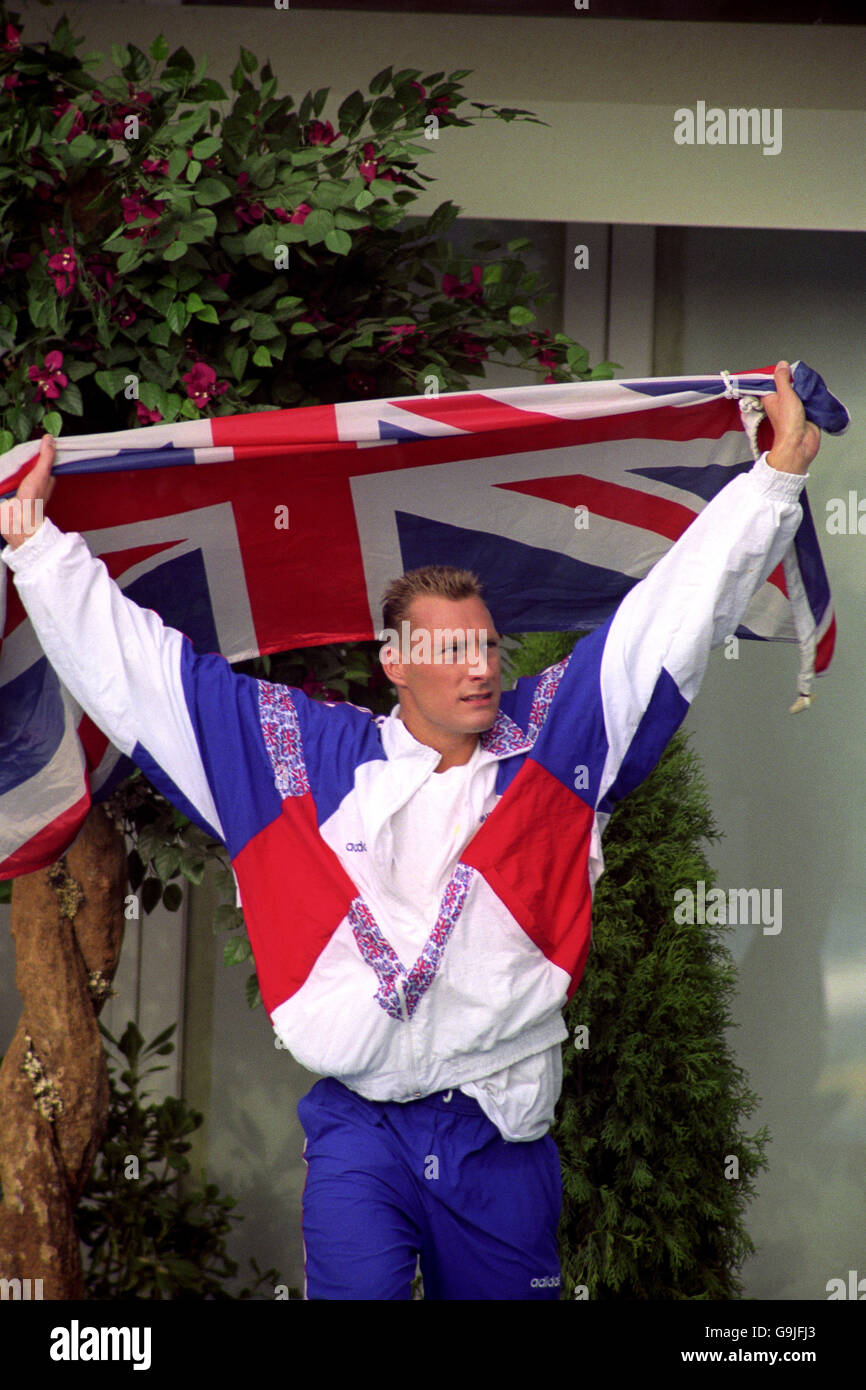 Great Britain's Nick Gillingham celebrates with a Union Flag after ...