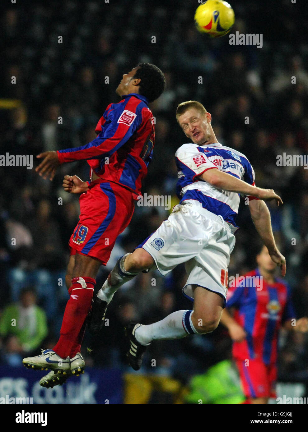 QPR's Steve Lomas (right) and Crystal Palace's Tom Soares jump for the ...