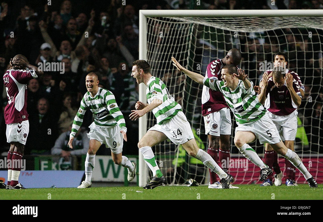 Celtic players celebrate their teams winning goal against Hearts during ...