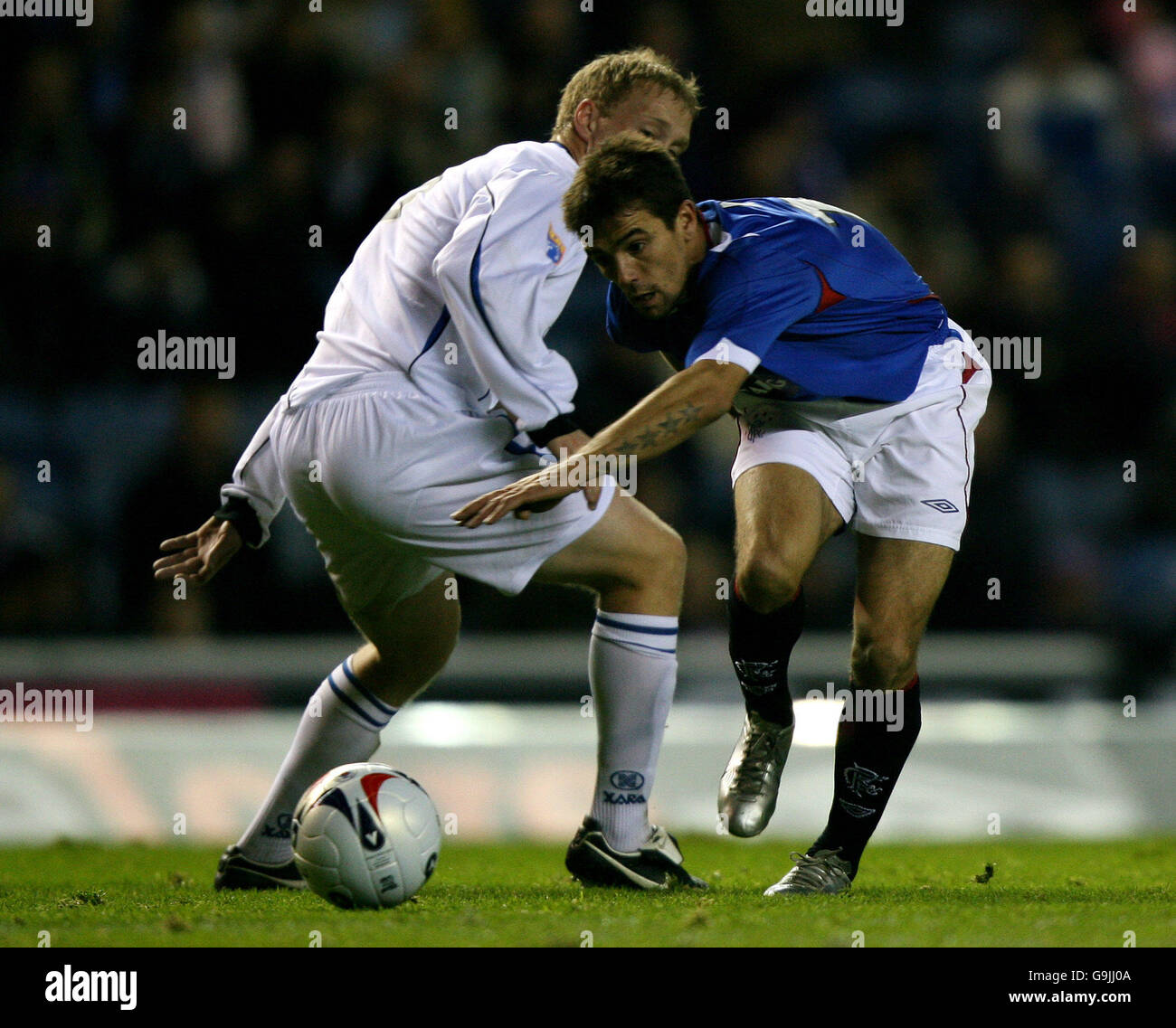 Rangers nacho novo and st johnstones steven anderson hi-res stock ...