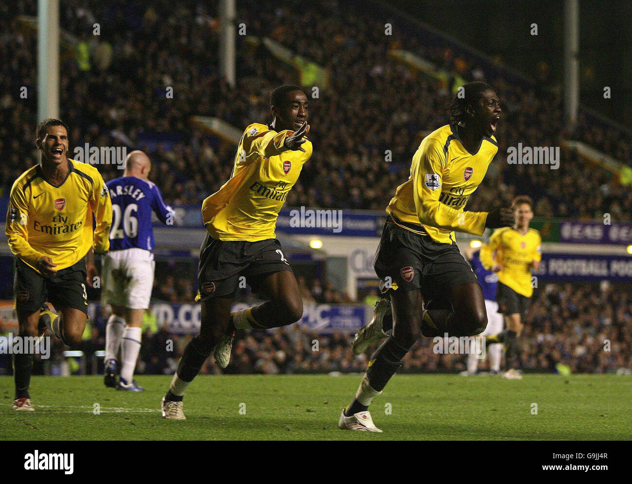 Arsenal's Emmanuel Adebayor (right) celebrates scoring the winning goal ...