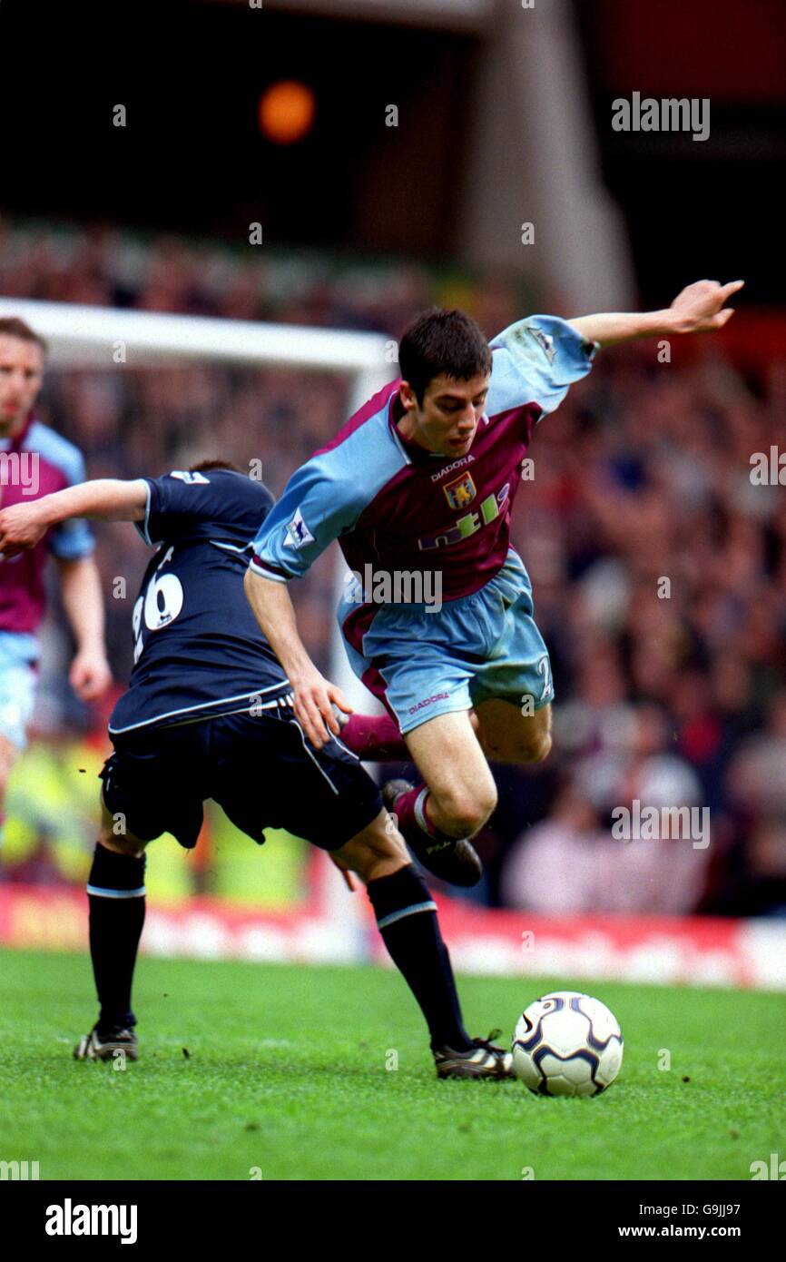 Aston Villa's Mark Delaney (r) is sent flying by a challenge from West ...