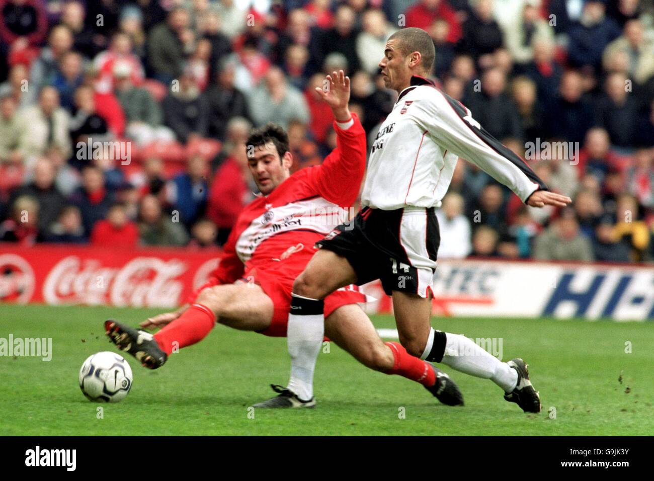 Middlesbrough's Jason Gavin slides in to tackle Ipswich Town's Jermaine ...