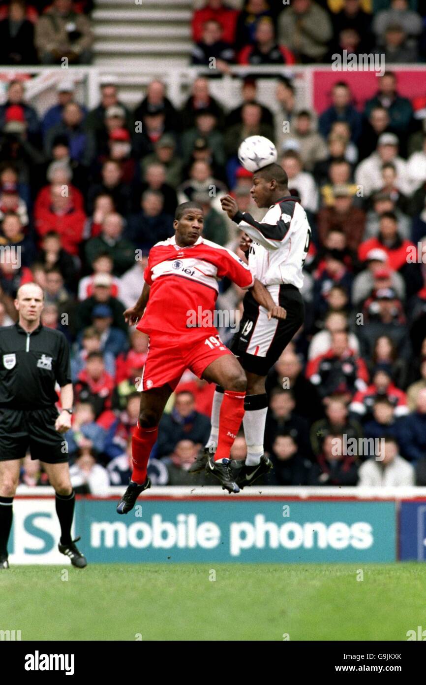 Middlesbrough's Hamilton Ricard (l) jumps for a header with Ipswich ...