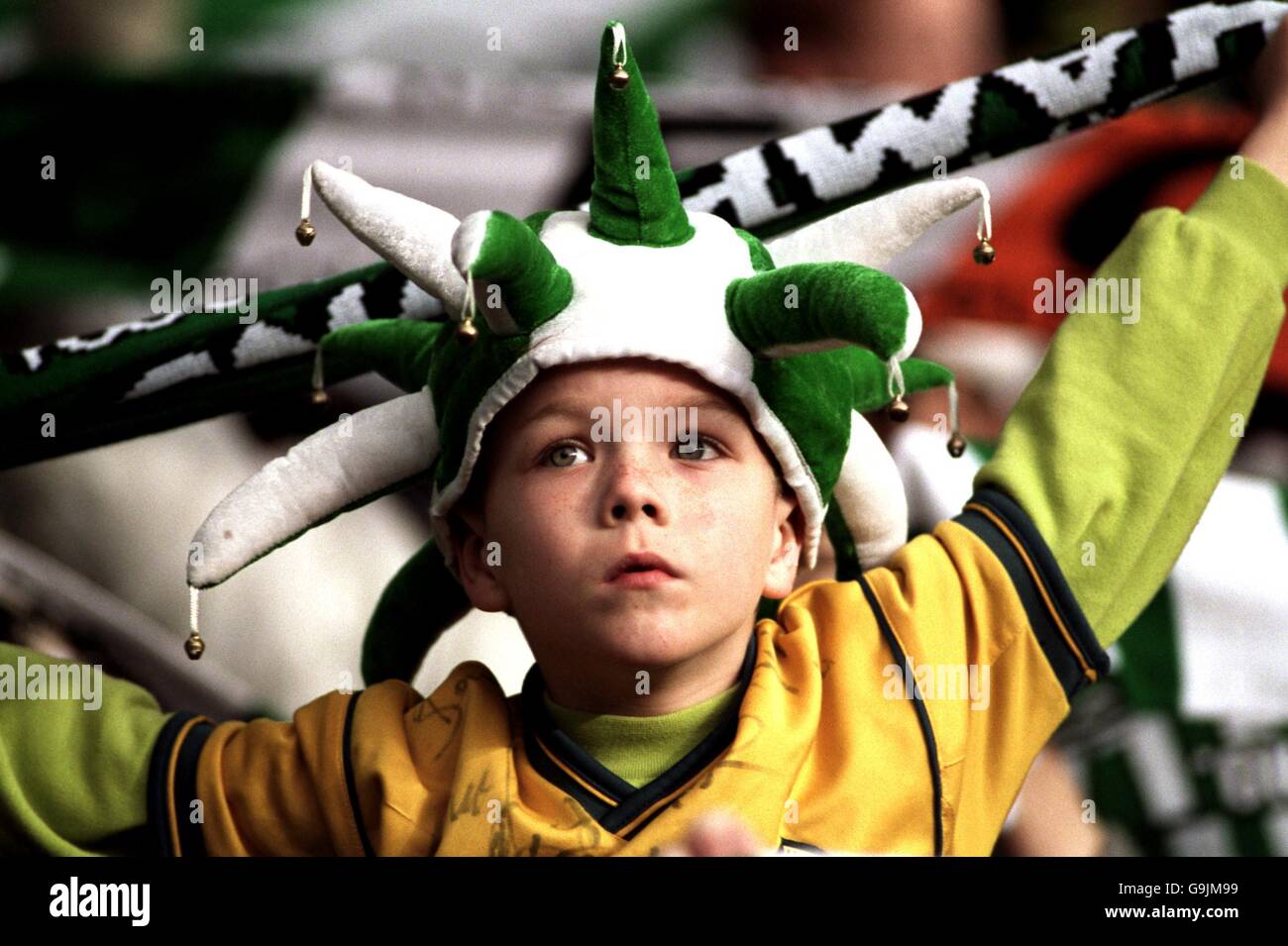 A young Celtic fan celebrates his side winning the league championship ...