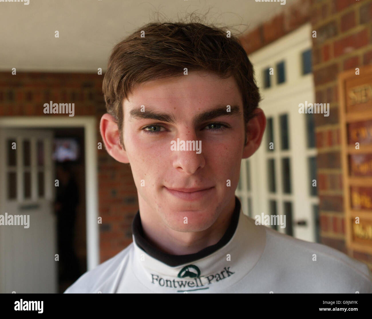 Jockey robert lucy butler at sandown racecourse hi-res stock ...