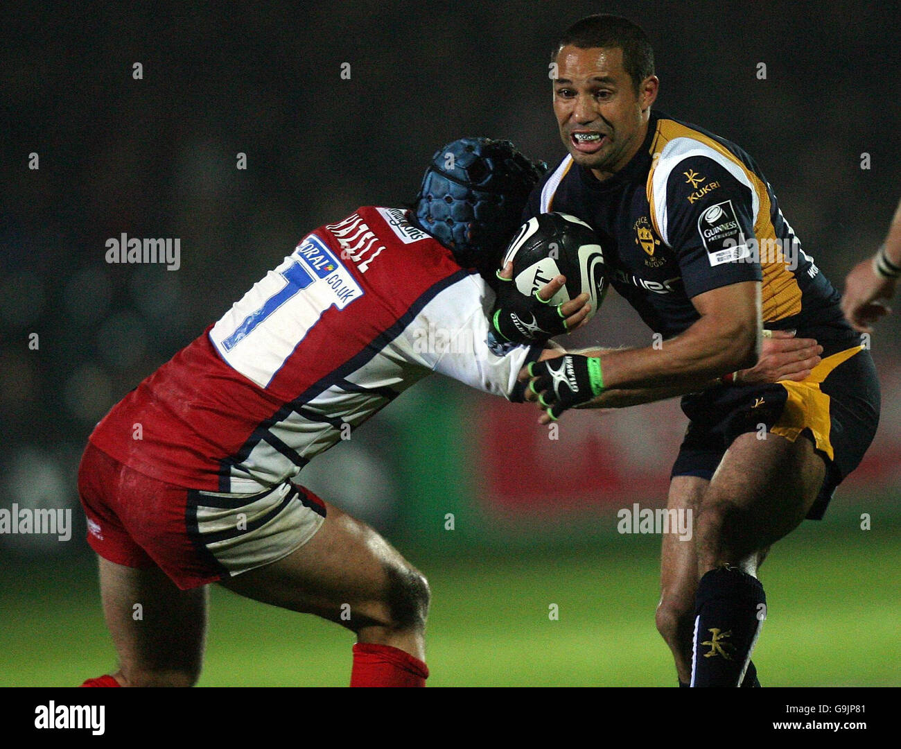 Worcester's Shane Drahm steps inside the tackle of Gloucester's Andy ...