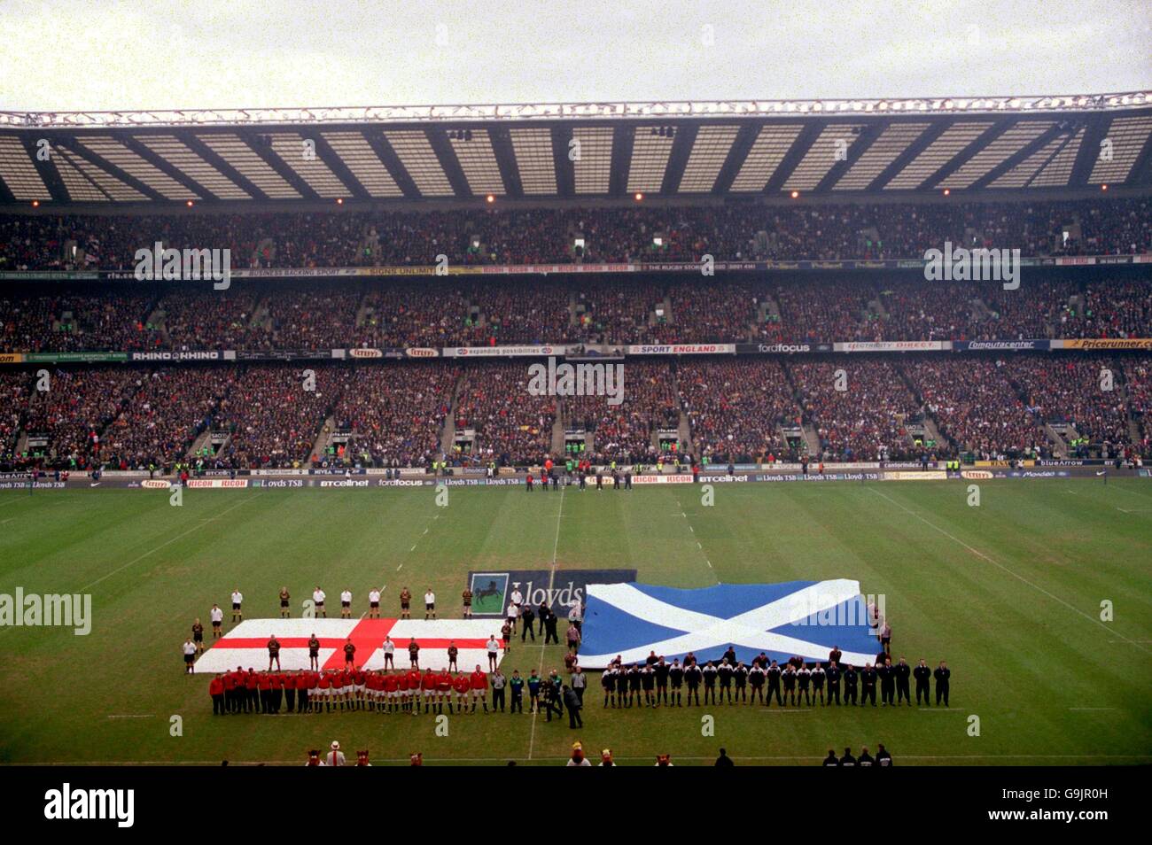 The two teams line up in front of their respective national flags Stock ...