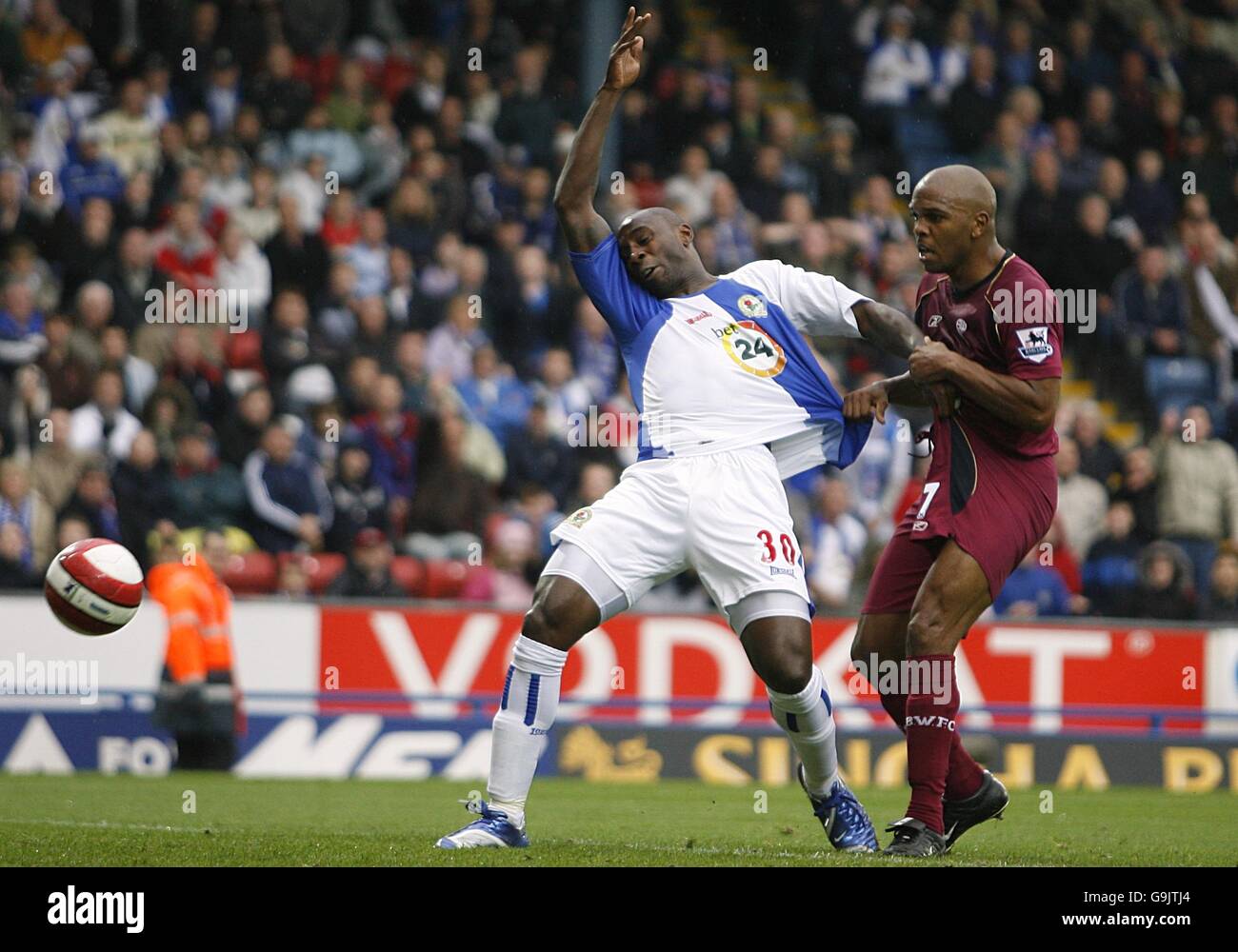 (L-R) Blackburn Rovers' Jason Roberts has his shirt pulled by Bolton ...