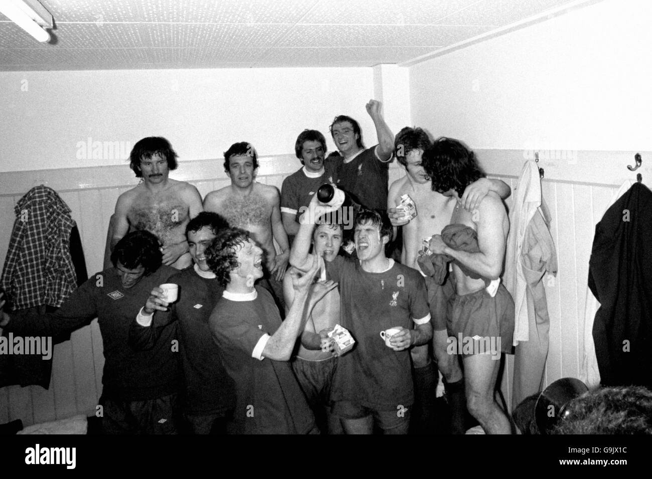 Liverpool celebrate winning the League Championship after their 3-1 ...
