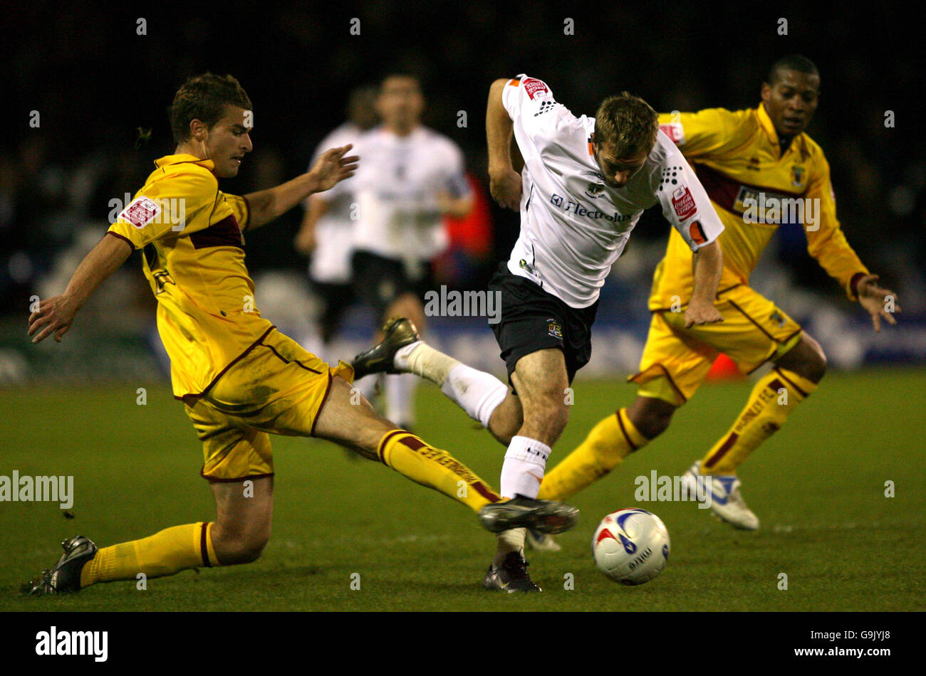 Burnley's Stephen Foster fouls Luton Town's Rowan Vine resulting in his ...