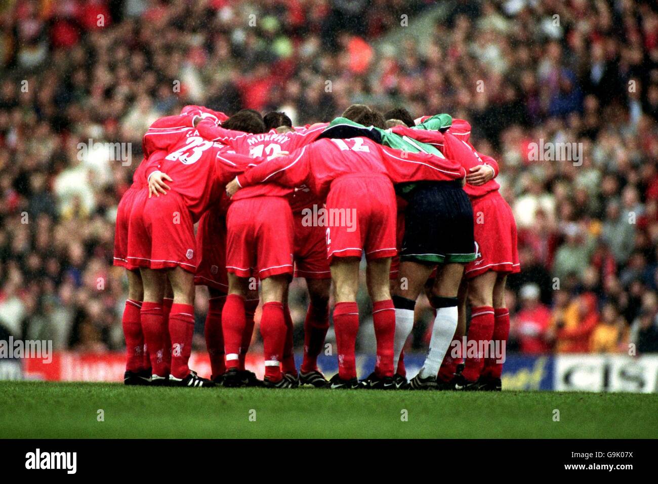 The liverpool players huddle together the start of the game hi-res ...