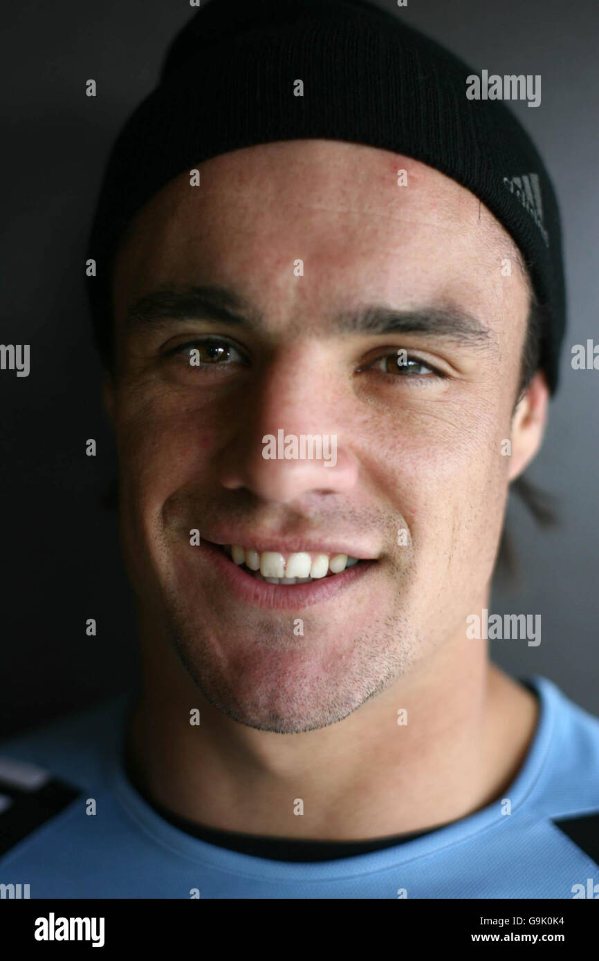 New Zealand's Dan Carter poses for a photograph following an open ...