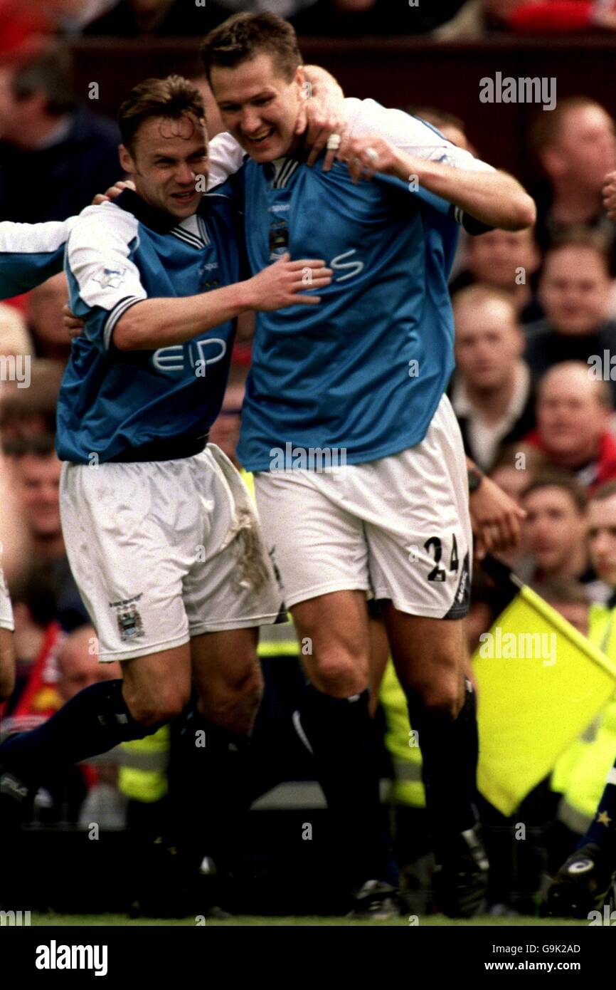 Manchester City's Steve Howey is congratulated on scoring their ...