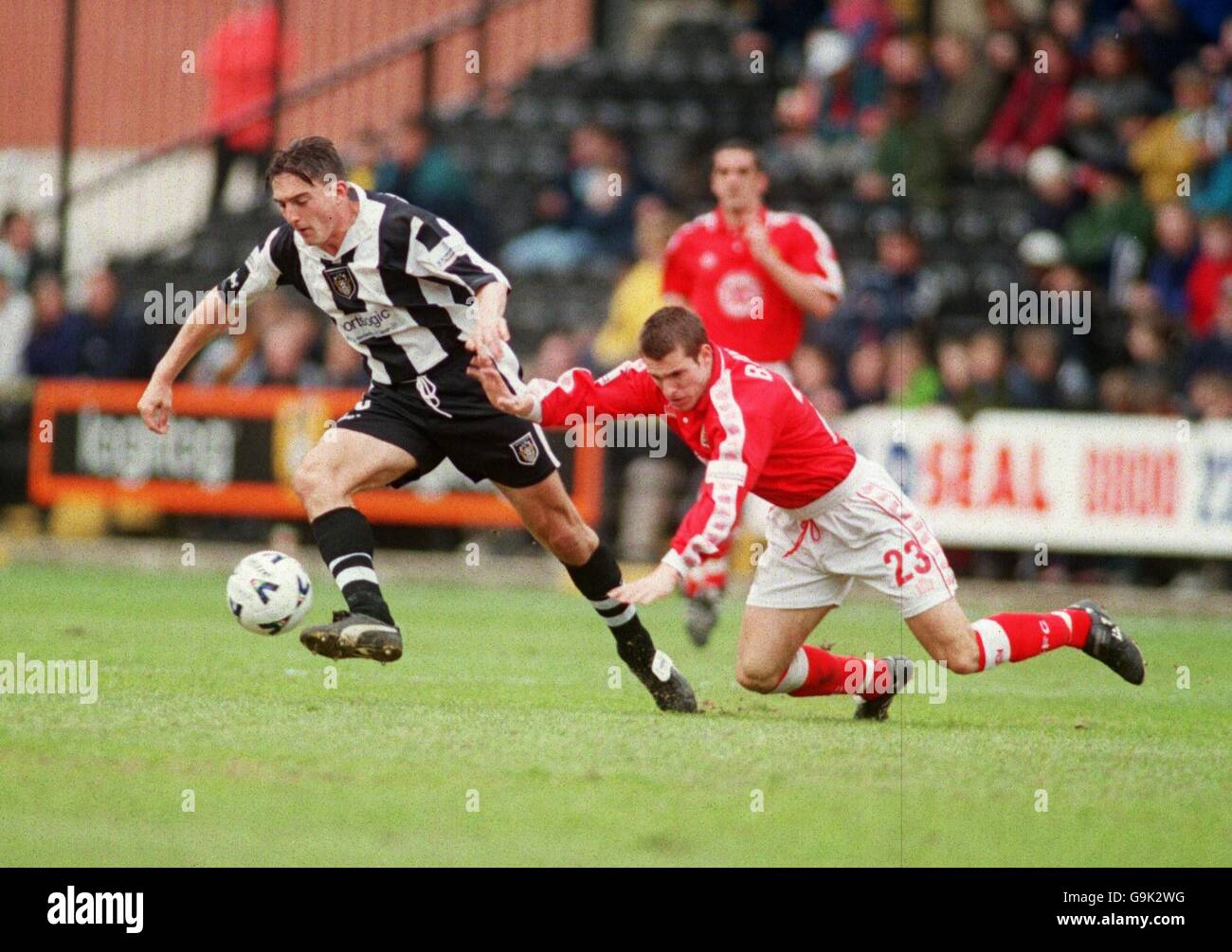 Bristol City's Joe Burnell is thrown to the floor after tussling for ...