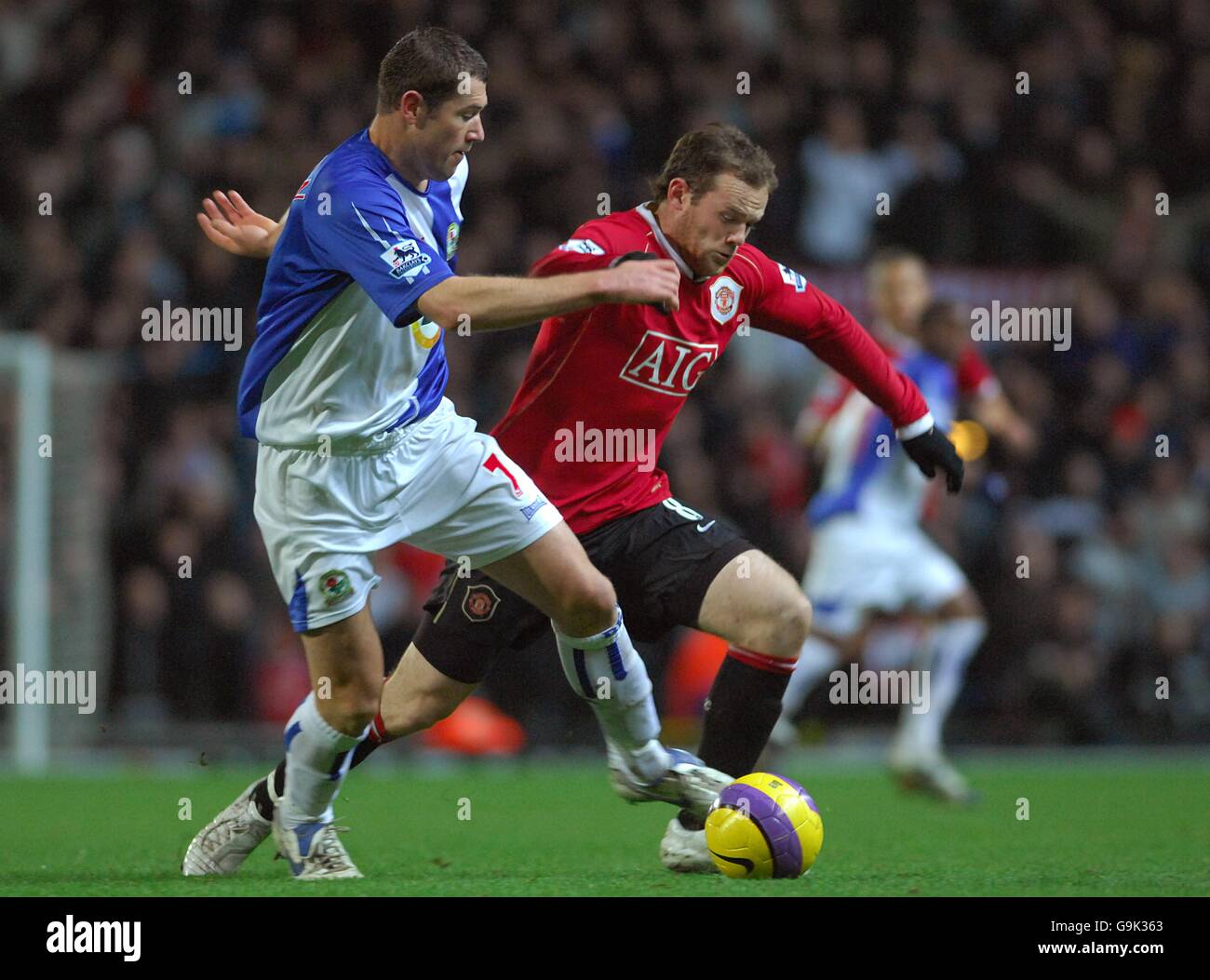 Brett Emerton, Blackburn (left) and Wayne Rooney, Manchester United ...