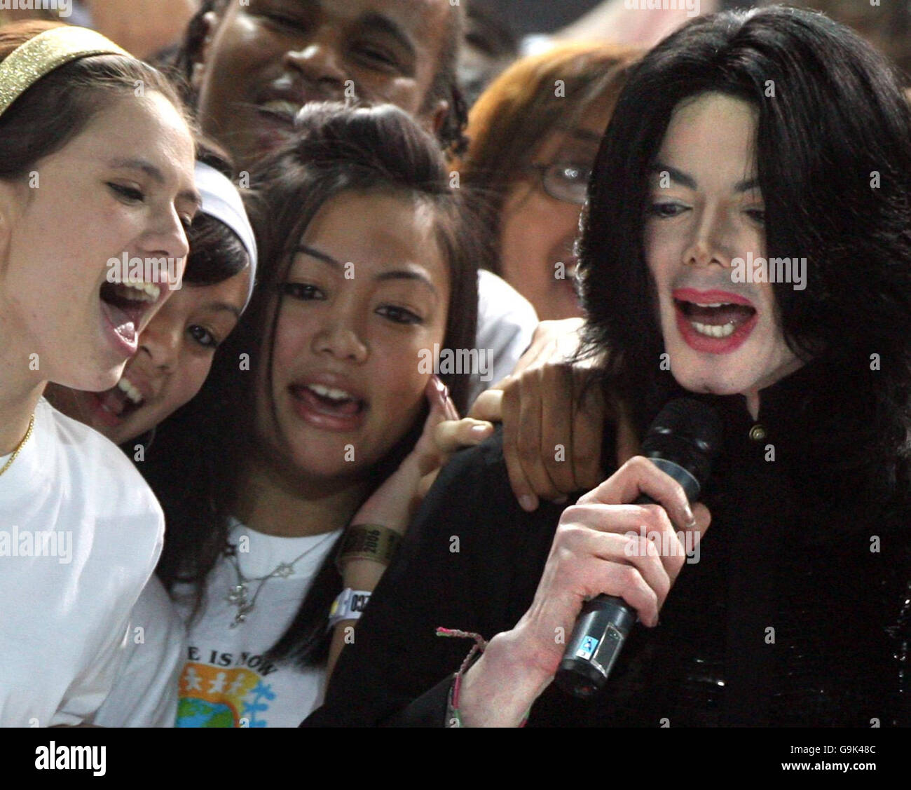 Michael Jackson performs 'We Are The World', on stage during the World ...