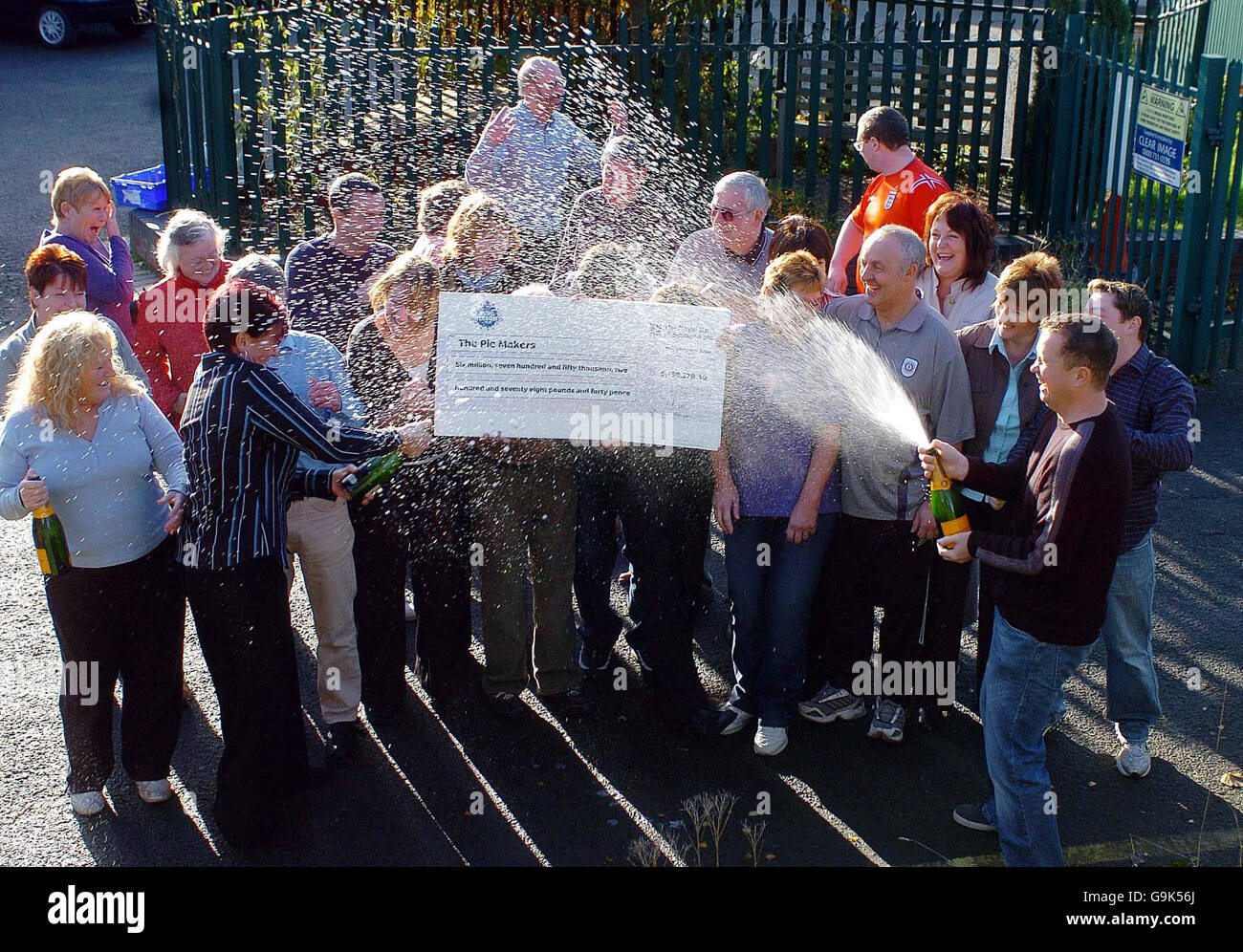 6,750,278.40 cheque which they won on the EuroMillions lottery, outside ...