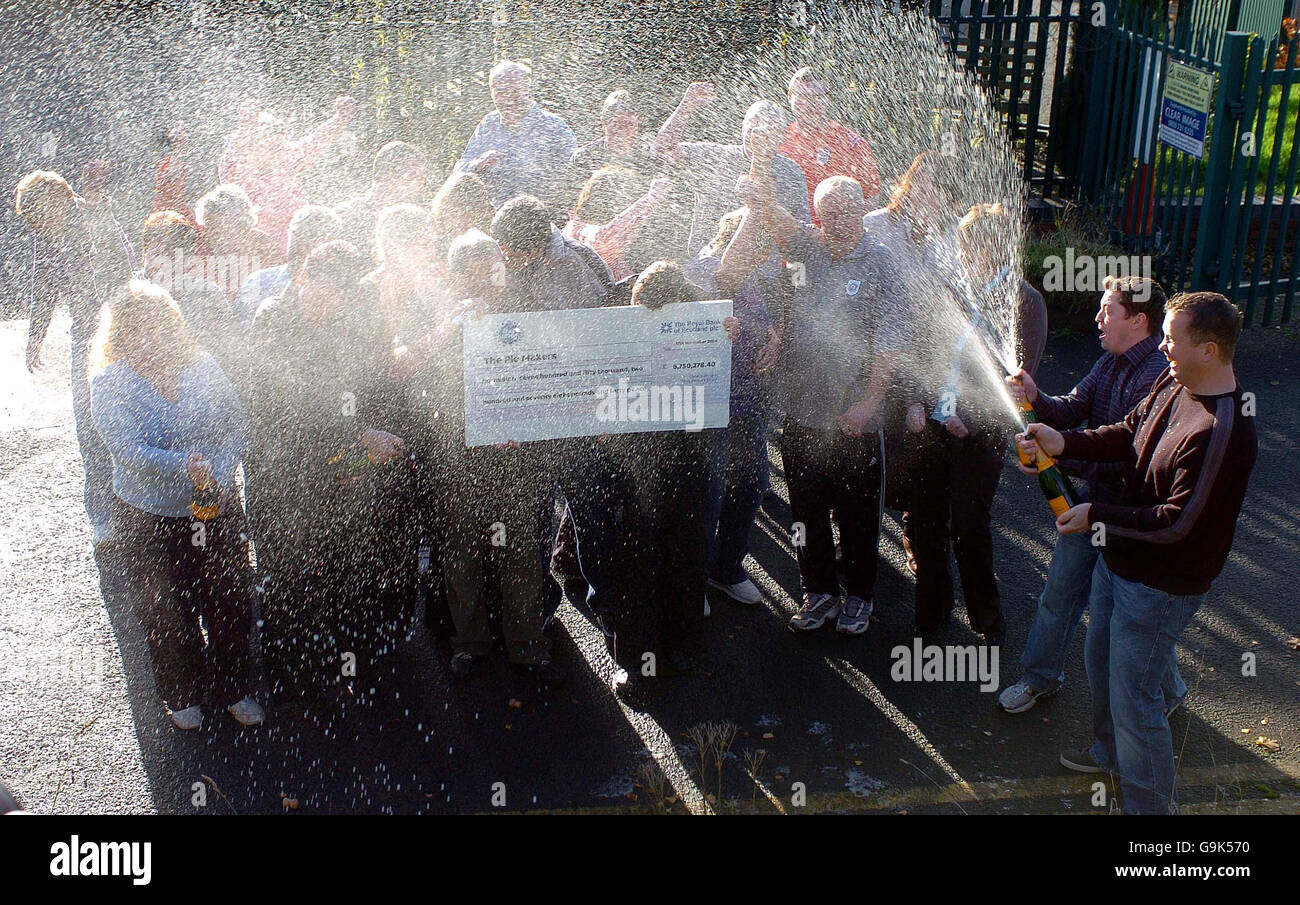 6,750,278.40 cheque which they won on the EuroMillions lottery, outside ...