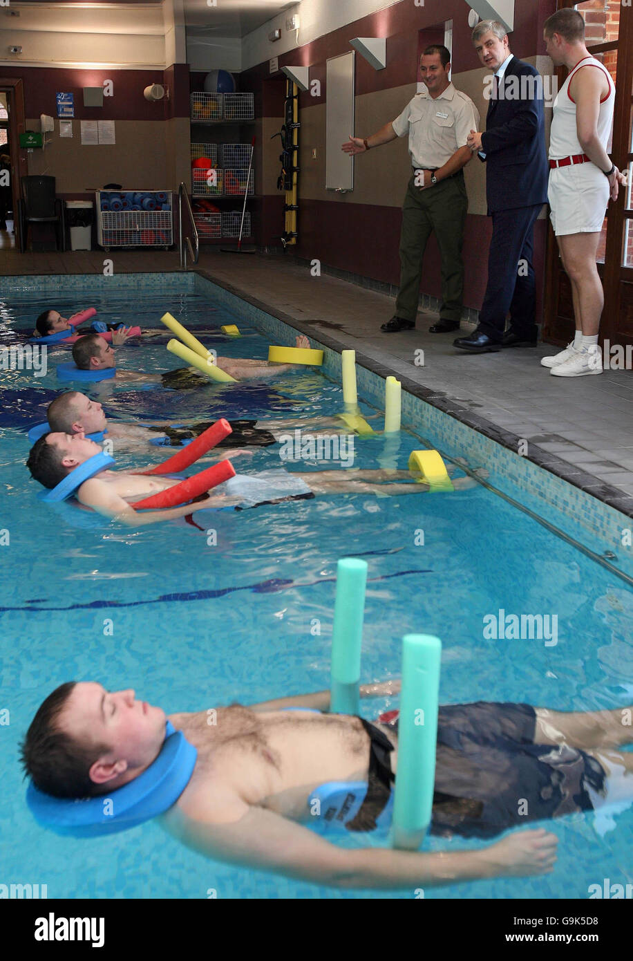 The Under Secretary for Defence Derek Twigg, right center, views the ...
