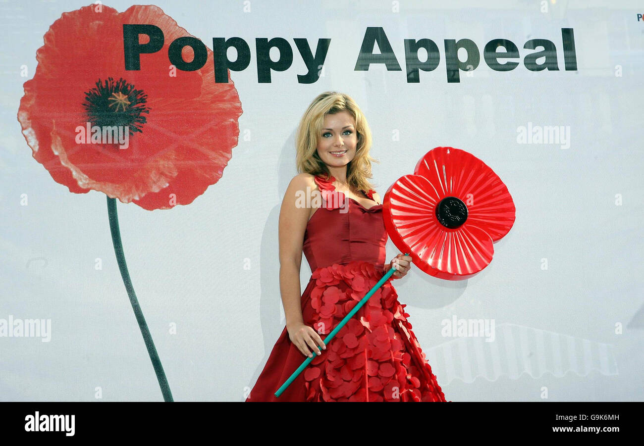 Singer Katherine Jenkins wears a dress made up of 2,500 poppies as she ...