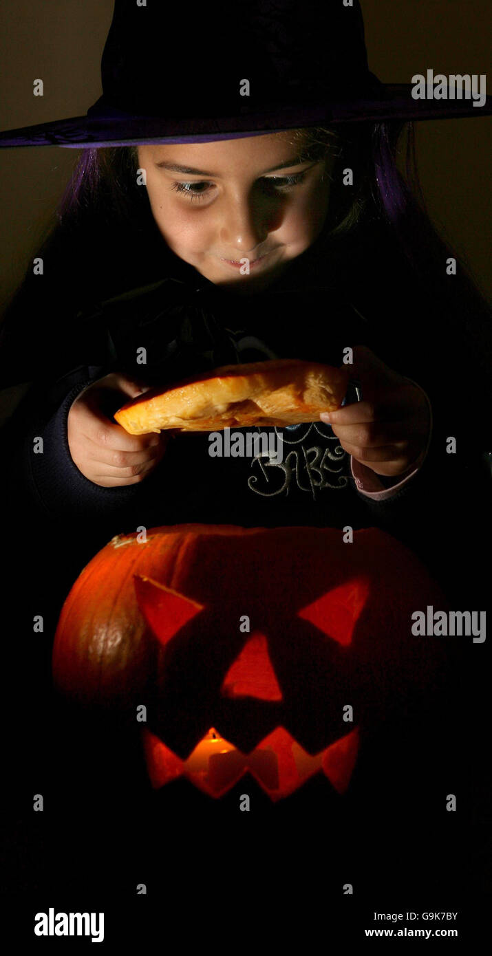 Inspects a halloween pumpkin hi-res stock photography and images - Alamy