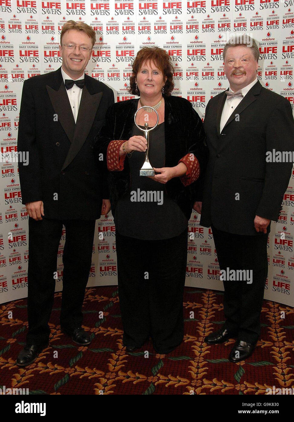Judith Starkey, from Chesham, hold her award with Julien Cozens from ...