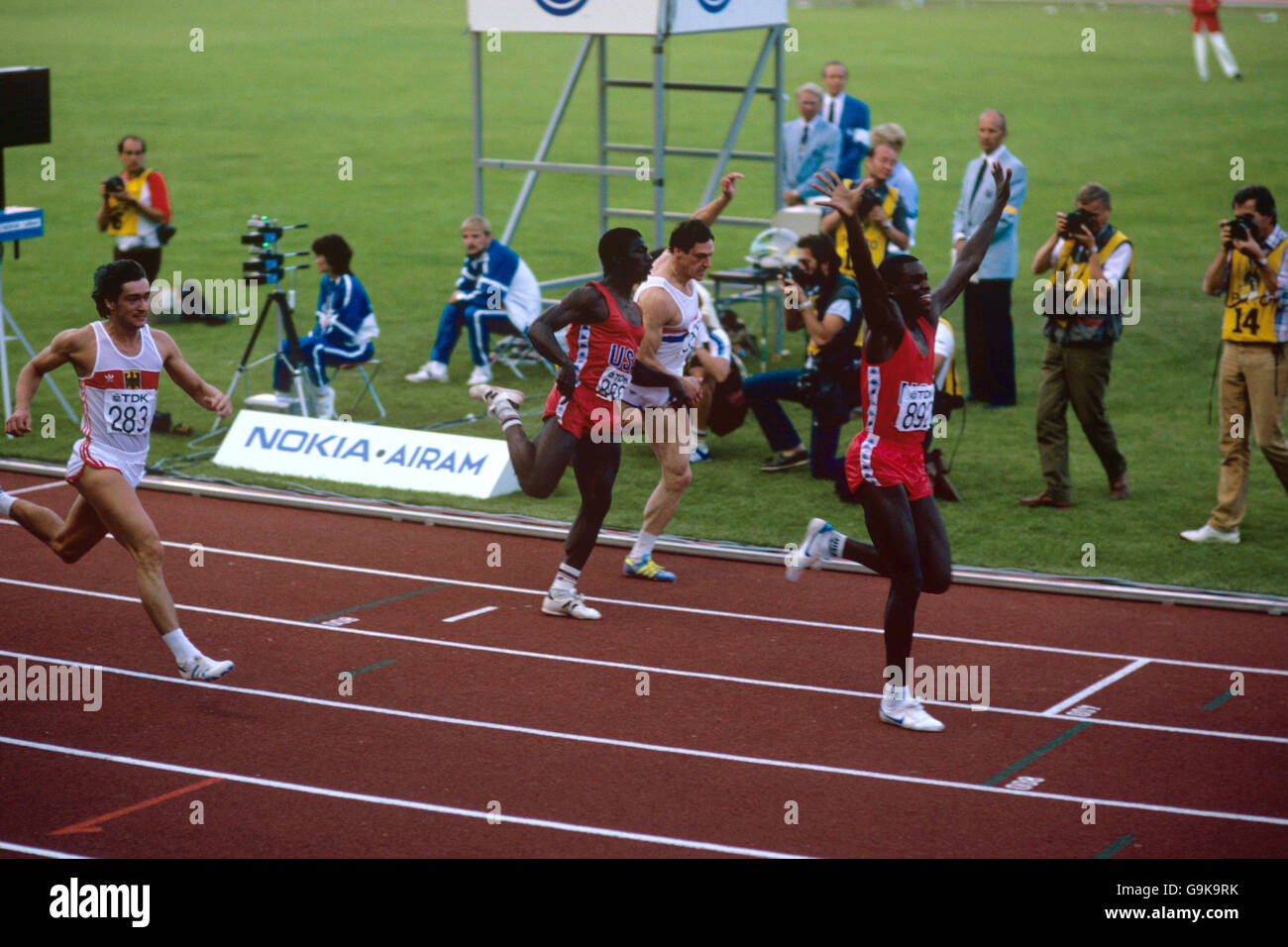 USA's Carl Lewis (r) celebrates as he comes home to win gold ahead of ...