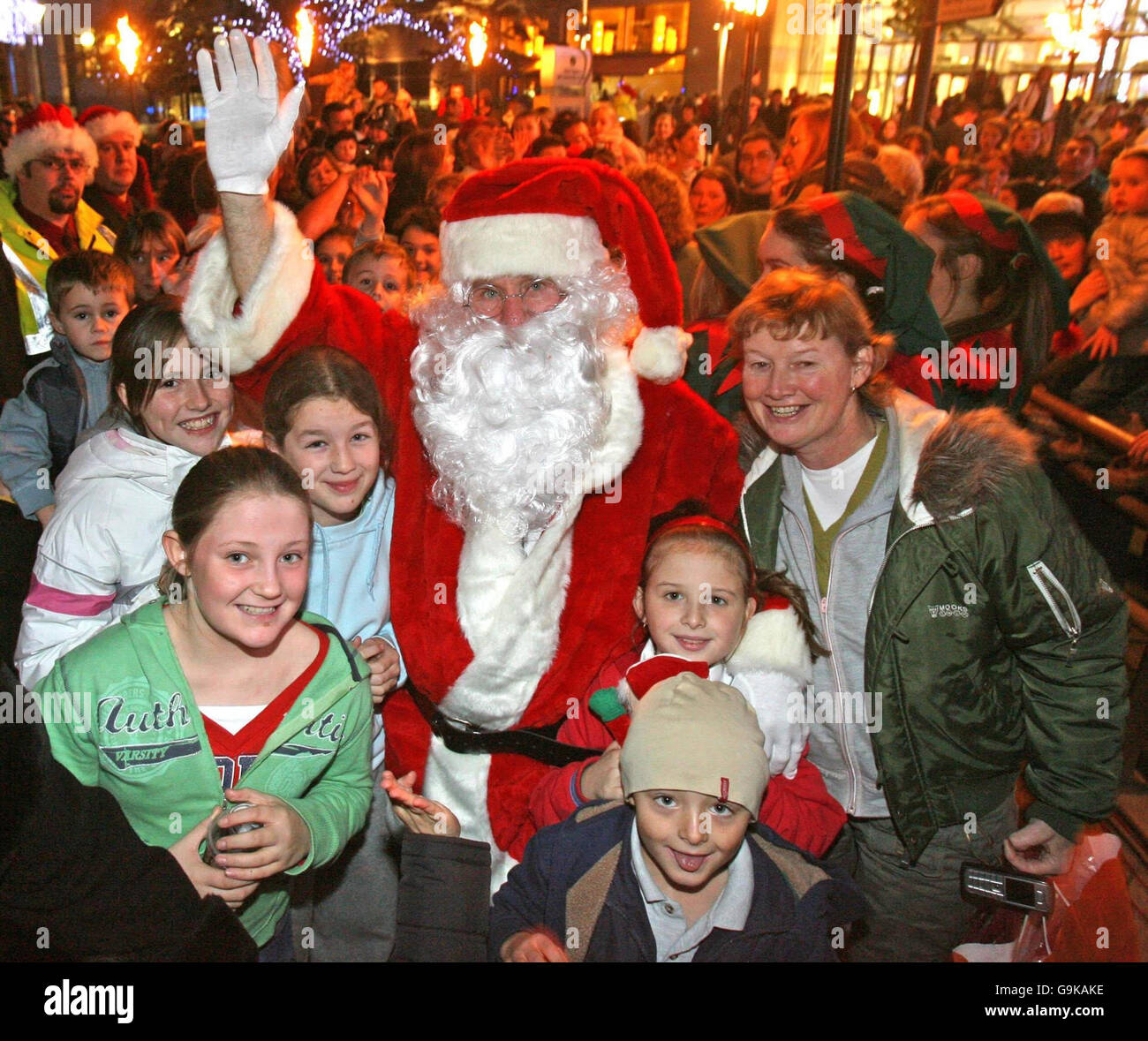 Santa is joined by hundreds of parents and children to switch on the ...