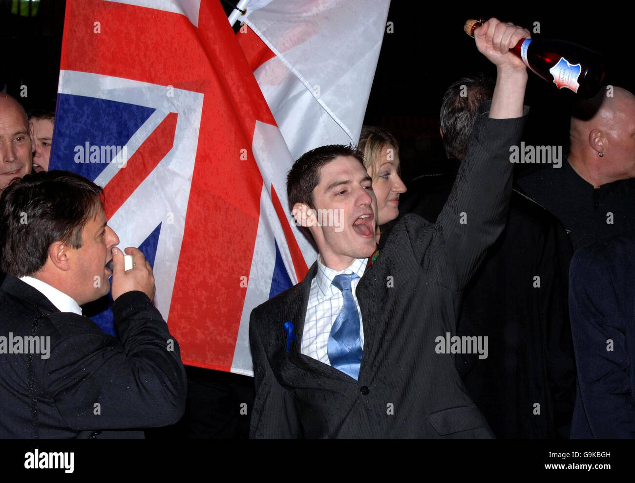 BNP Party Leader Nick Griffin(left) and Mark Collett open champagne as ...