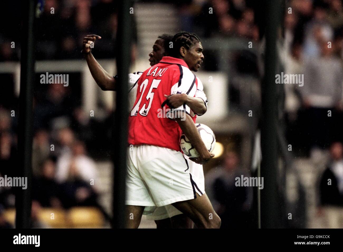Arsenal's Kanu and Lauren celebrate Kanu scoring Arsenal's first goal ...