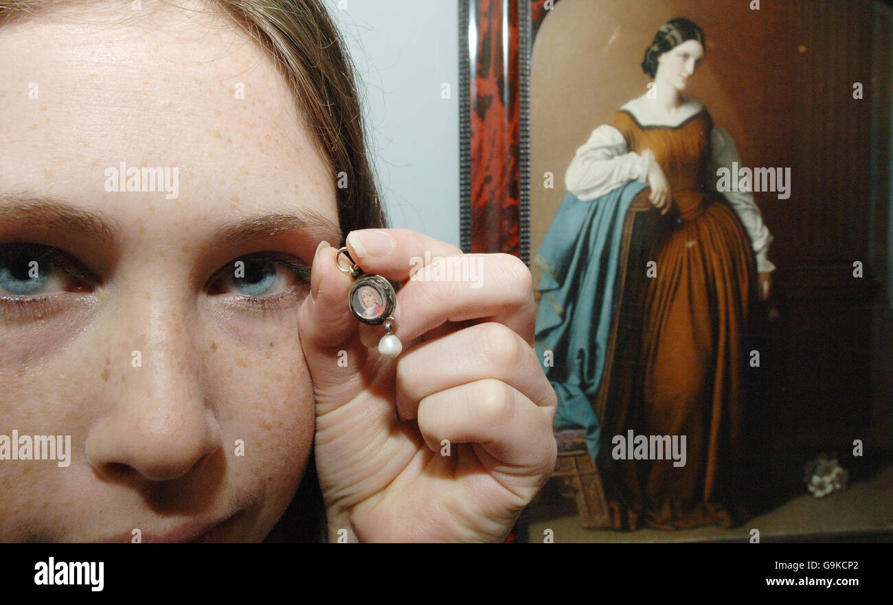 Press Assistant Holly Nuttall holds the smallest miniature portrait in ...