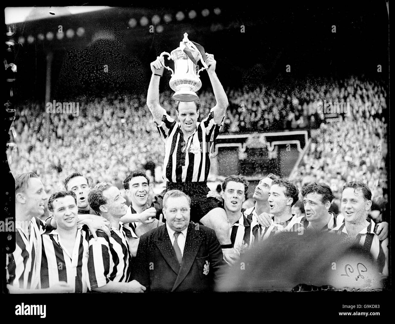 Newcastle united captain jimmy scoular top lifts the fa cup hi-res ...