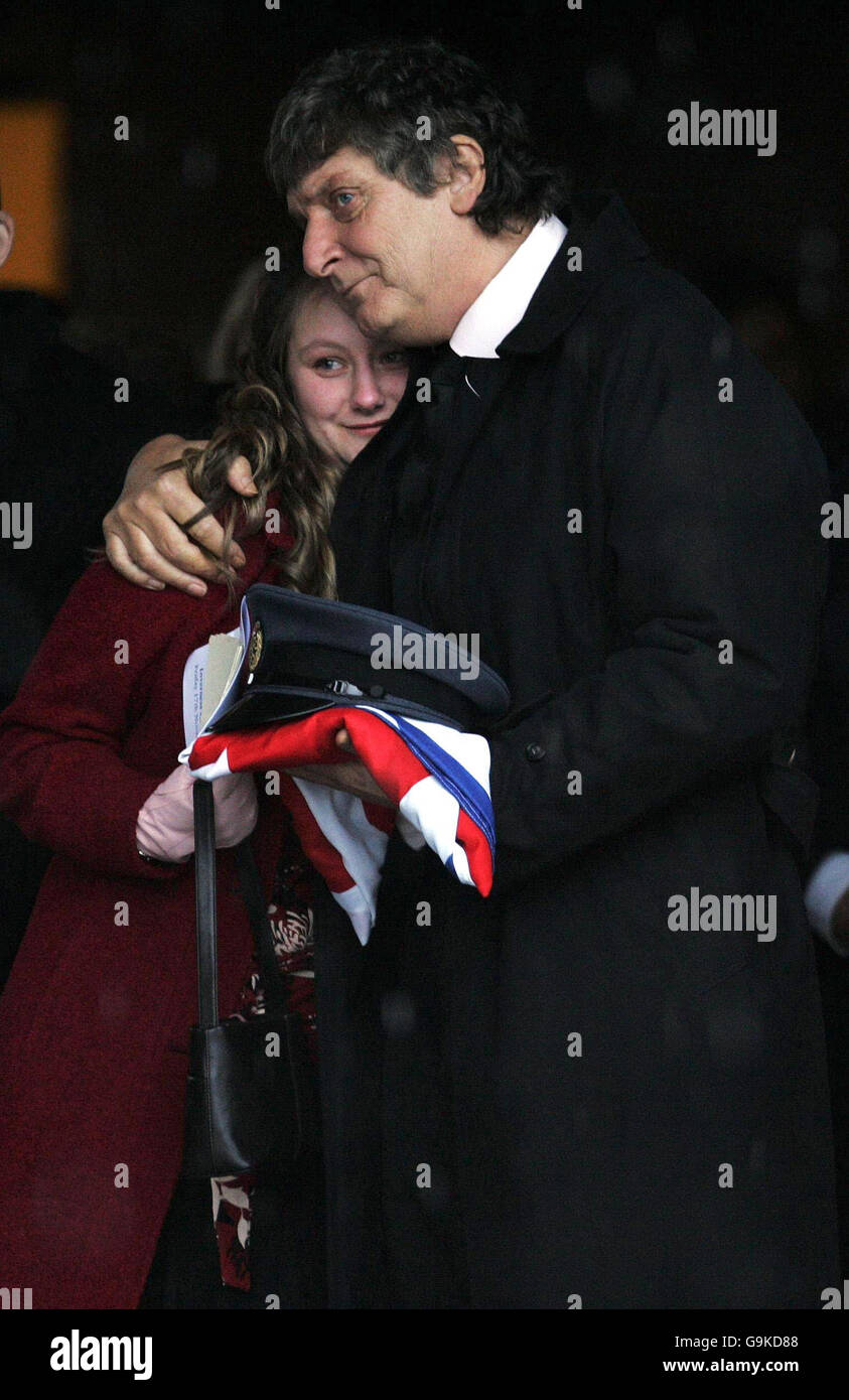 Sergeant Ben Knight's fiancee Tania and father Graham watch a flypast ...