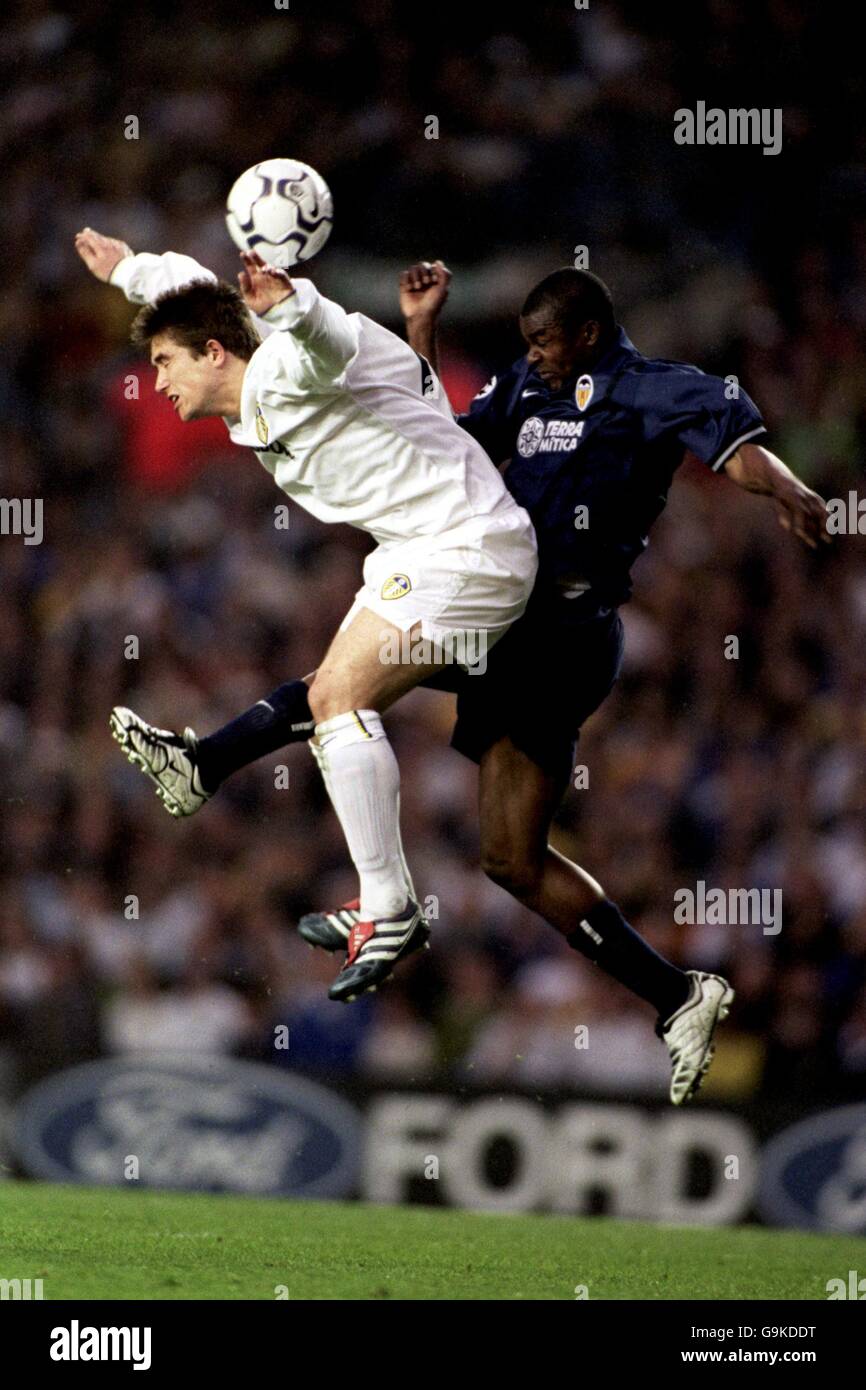 Leeds United's Harry Kewell and Valencia's Jocelyn Angloma battle for ...