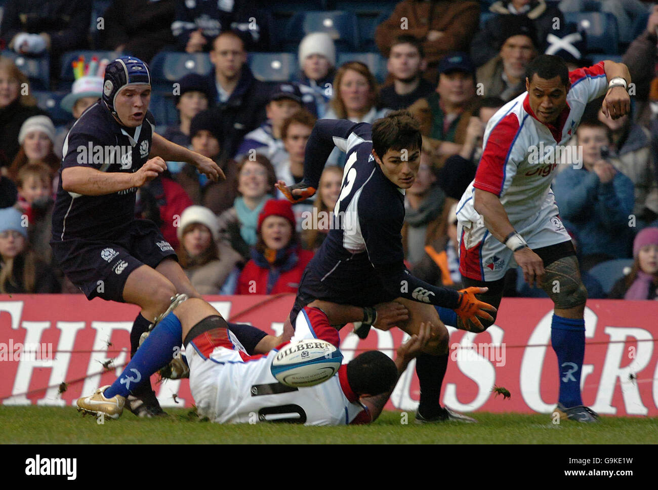 Scotland's Marcus Di Rollo (second from right) tussles with Pacific ...