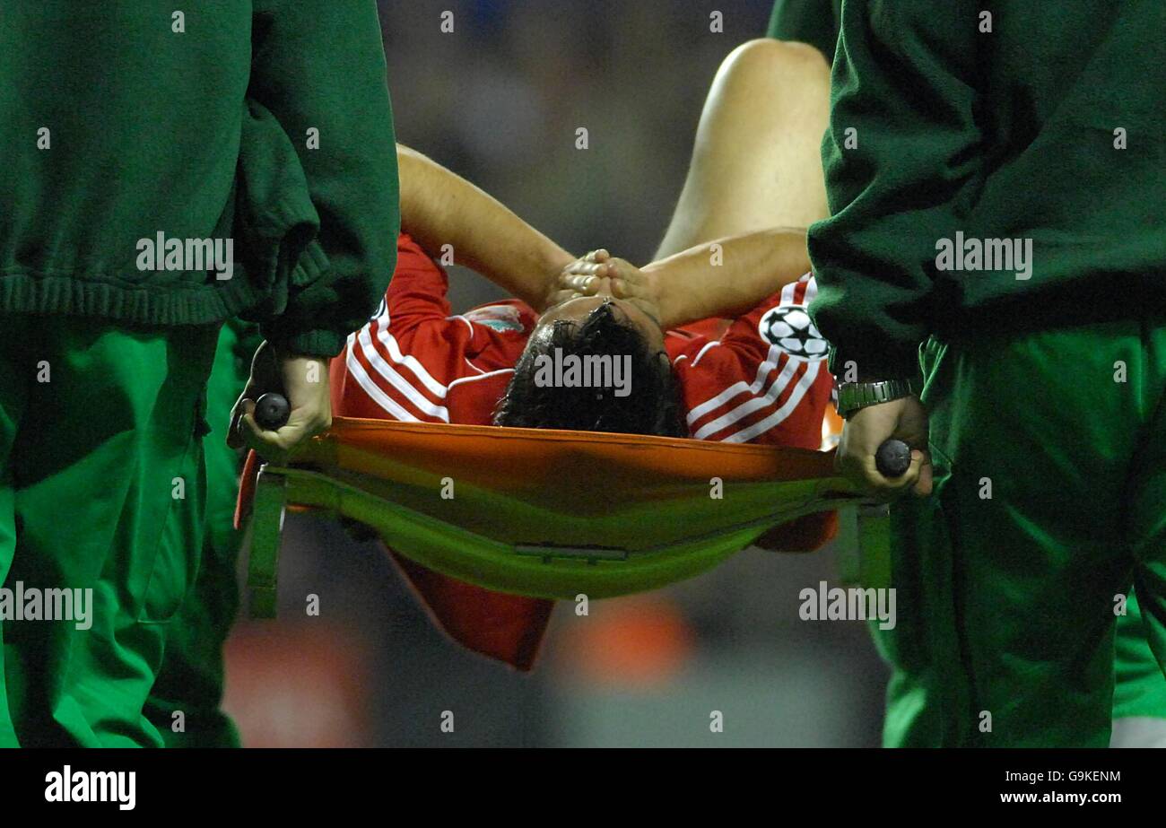 Liverpools mark gonzalez is stretchered off with a hamstring injury hi ...