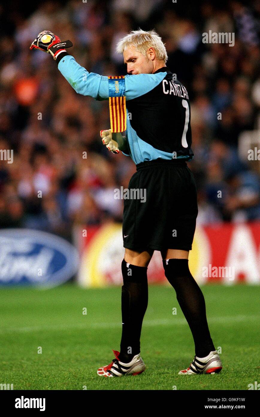 Valencia goalkeeper Santiago Canizares puts on the captain's armband ...