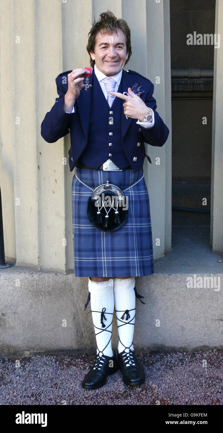 Glasgow's Radio Clyde DJ Tiger Tim Stevens proudly shows off his MBE in ...